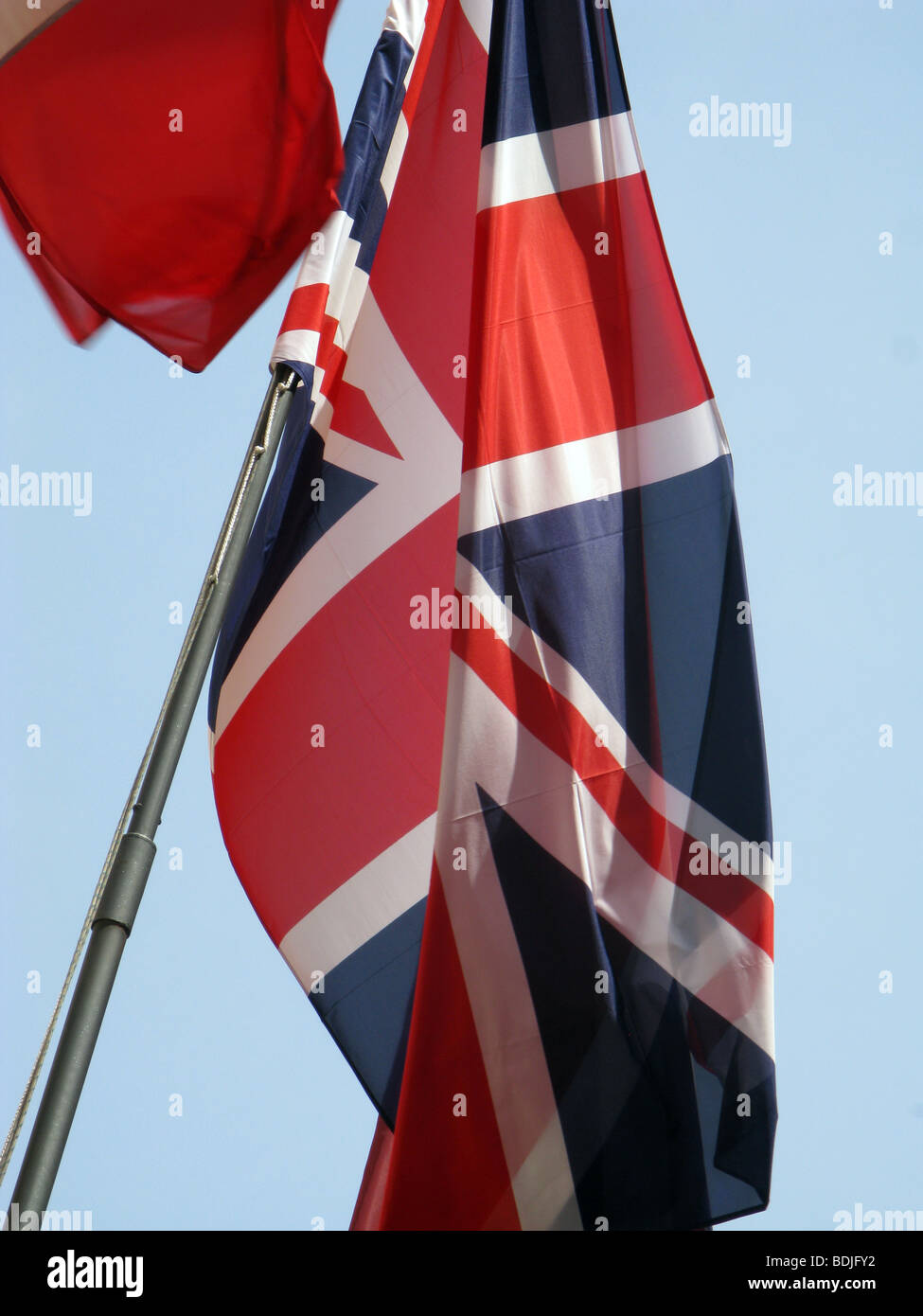 union jack flag flying in wind in sun Stock Photo - Alamy