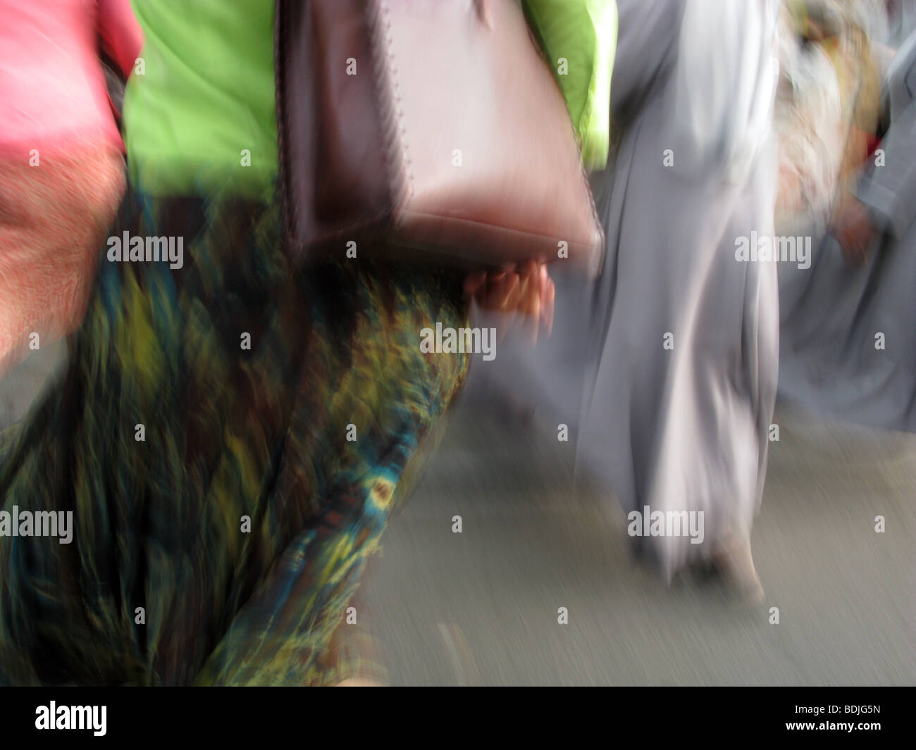 fast speed women feet legs walking in street in town Stock Photo - Alamy
