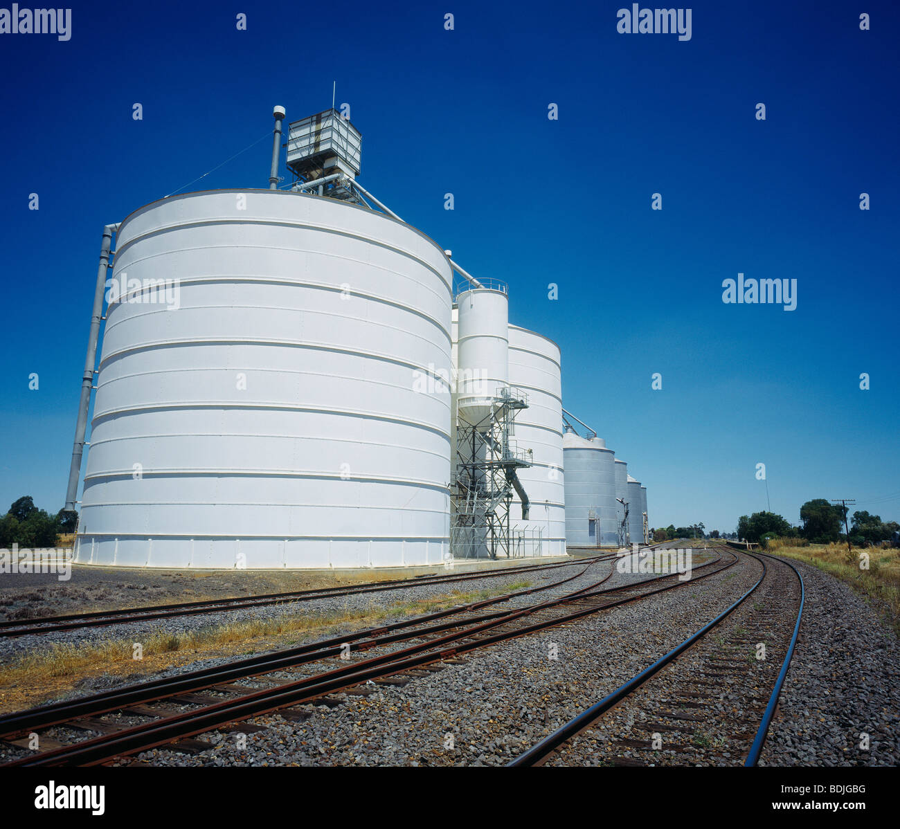 Grain Silos beside Railway Line Stock Photo - Alamy