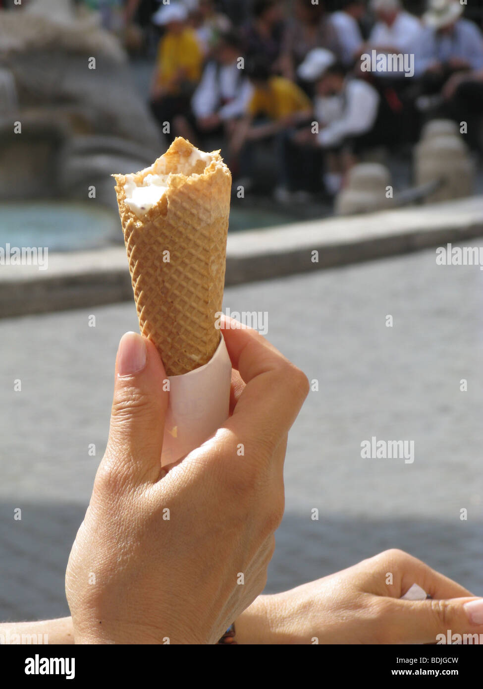 woman holding ice cream cone in rome Stock Photo - Alamy