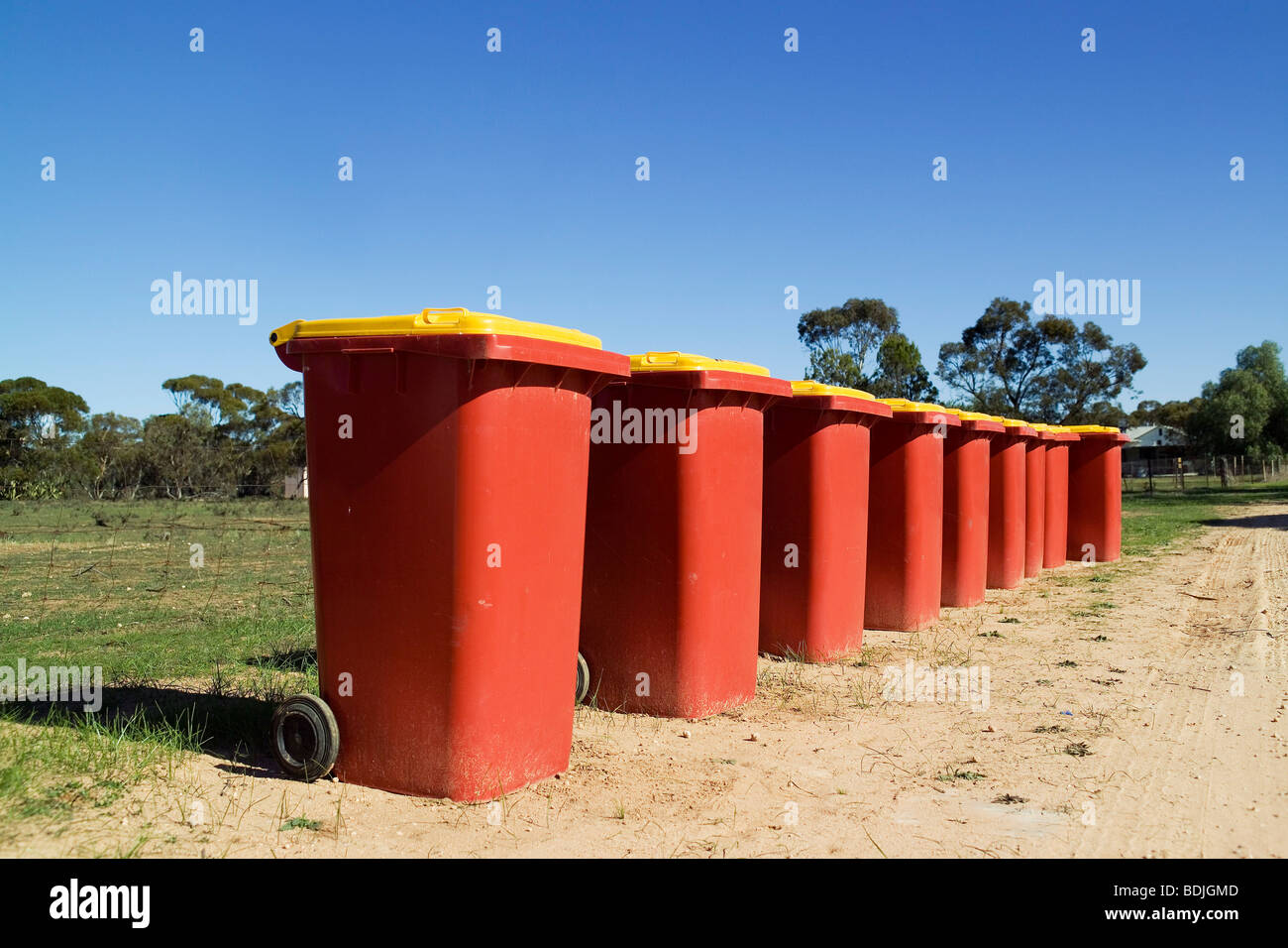 Row of Rubbish Bins Stock Photo - Alamy