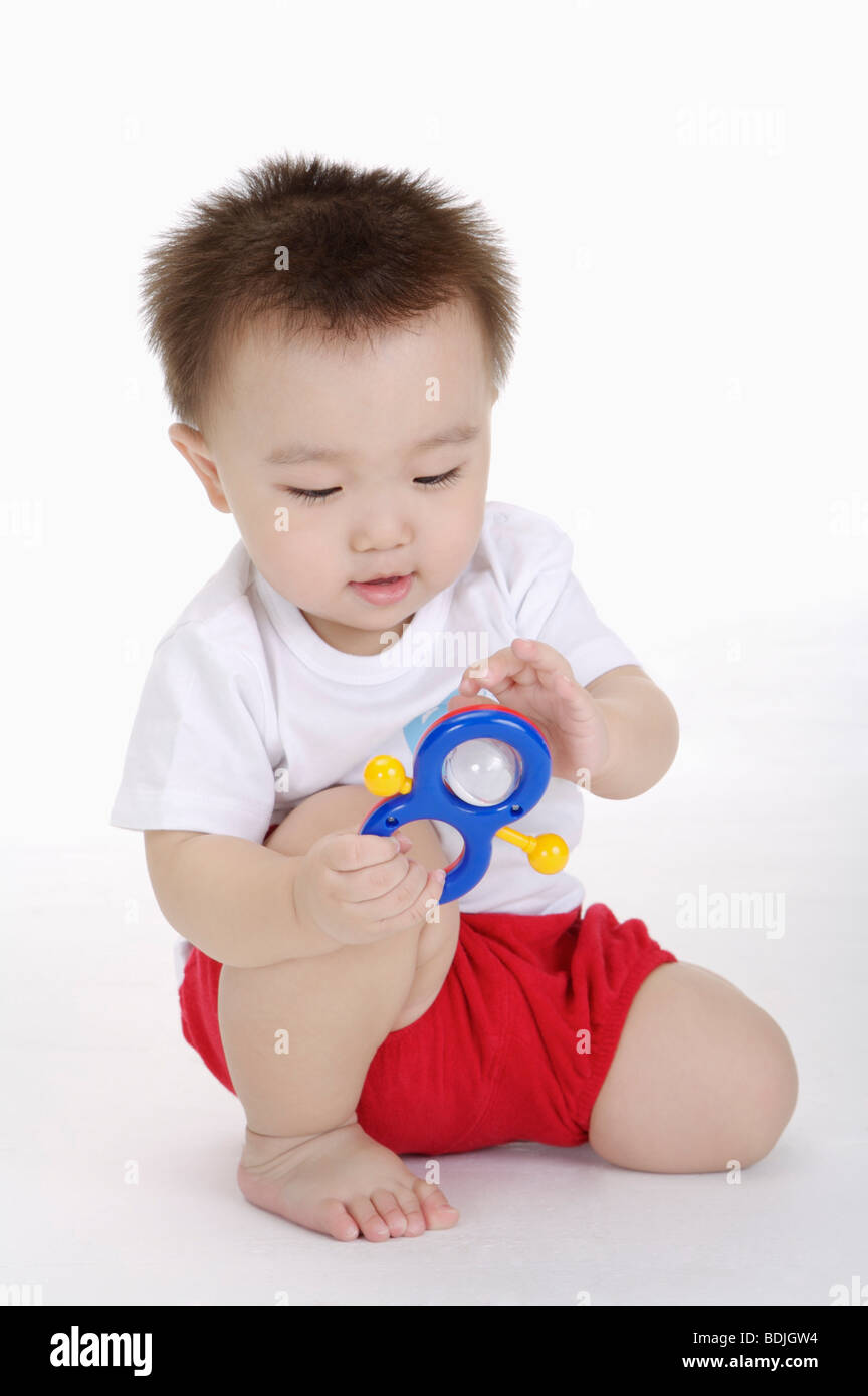 Chinese boys playing hi-res stock photography and images - Alamy