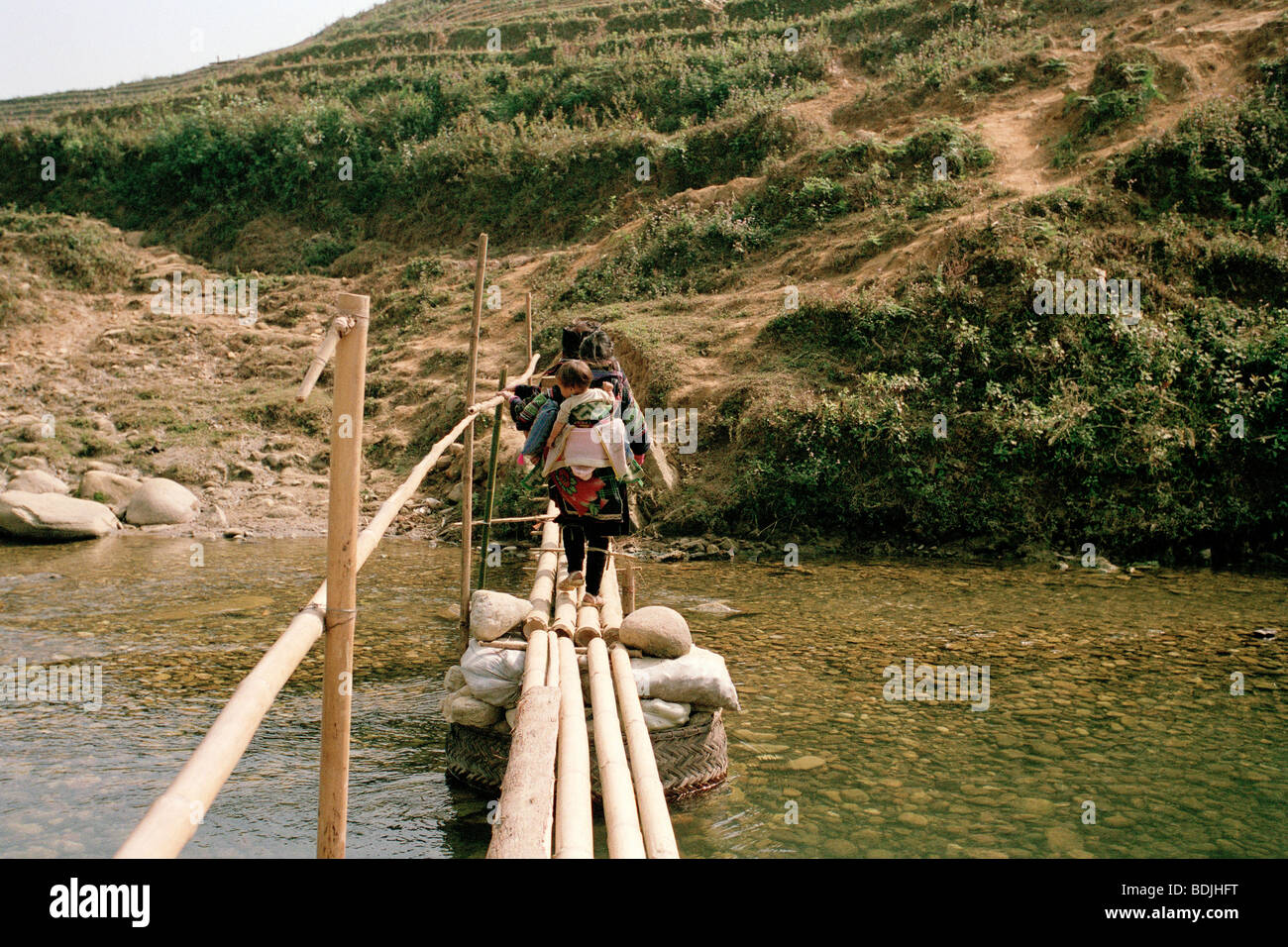 People Crossing Bridge near Sa Pa, Northern Vietnam Stock Photo - Alamy