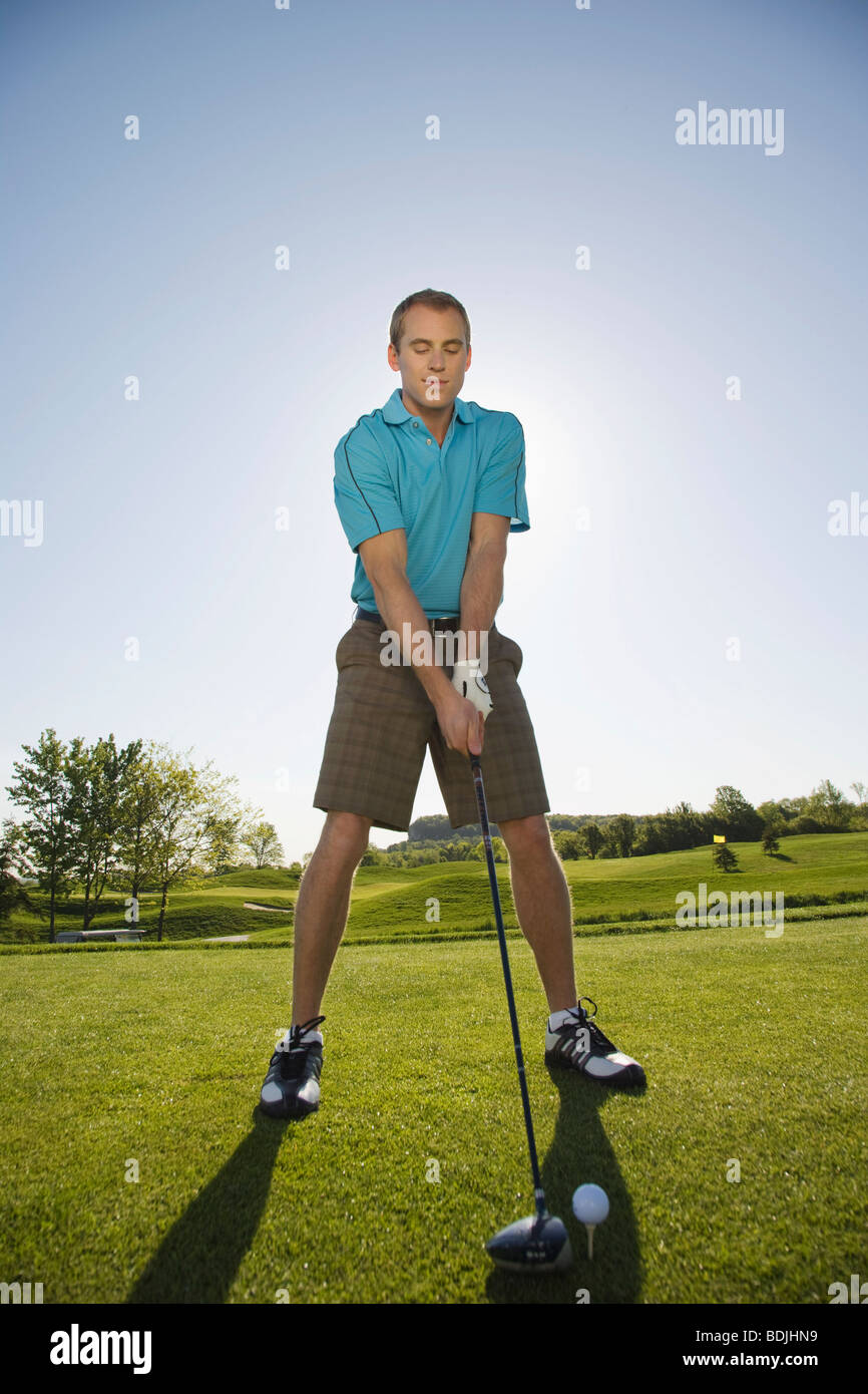 Golfer man swing ball back hi-res stock photography and images - Alamy