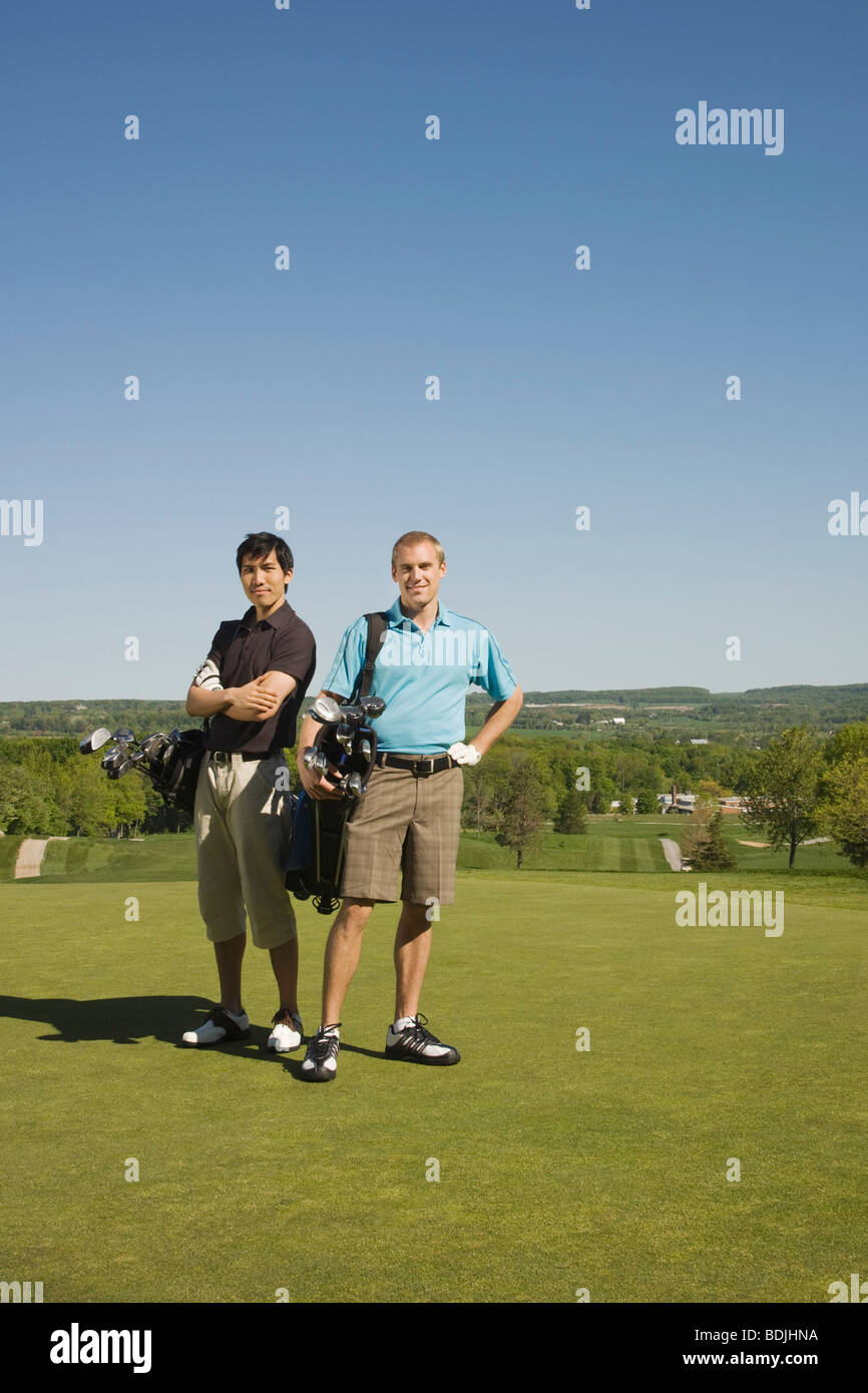 Men on Golf Course Stock Photo - Alamy