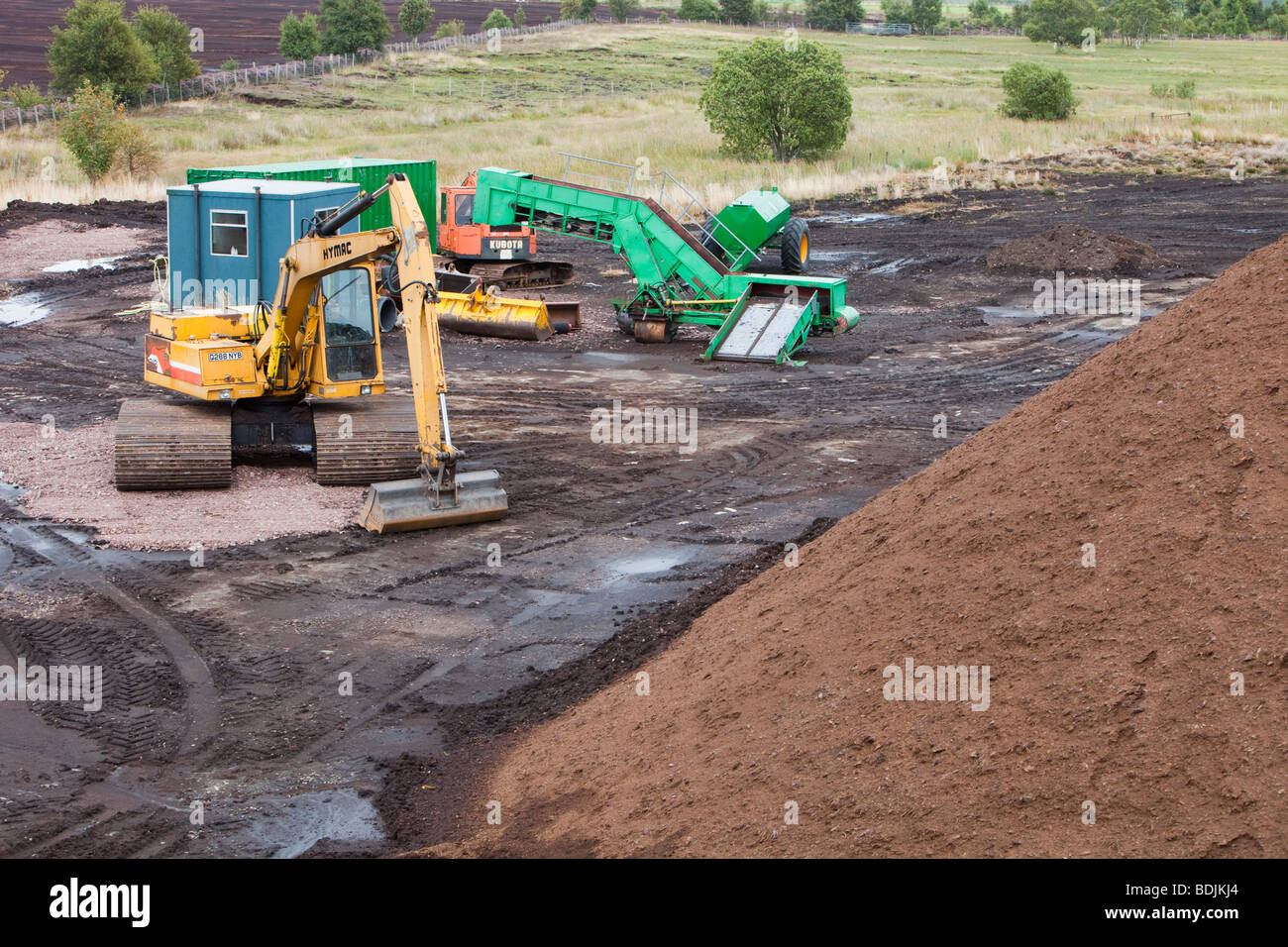 Mining peat from an raised peat bog near Douglas in Lanarkshire ...