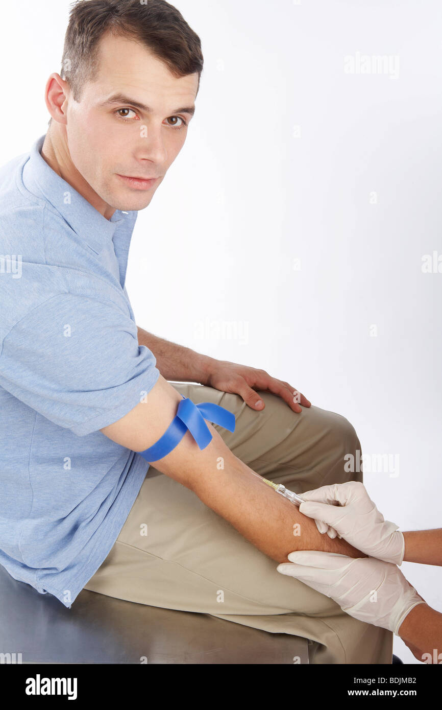 Patient Getting a Needle Stock Photo - Alamy