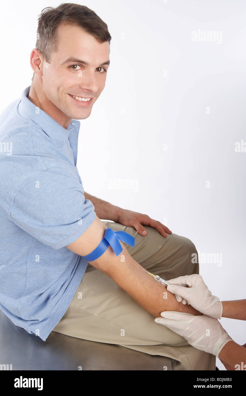 Medical examination table 20s young man hi-res stock photography and ...