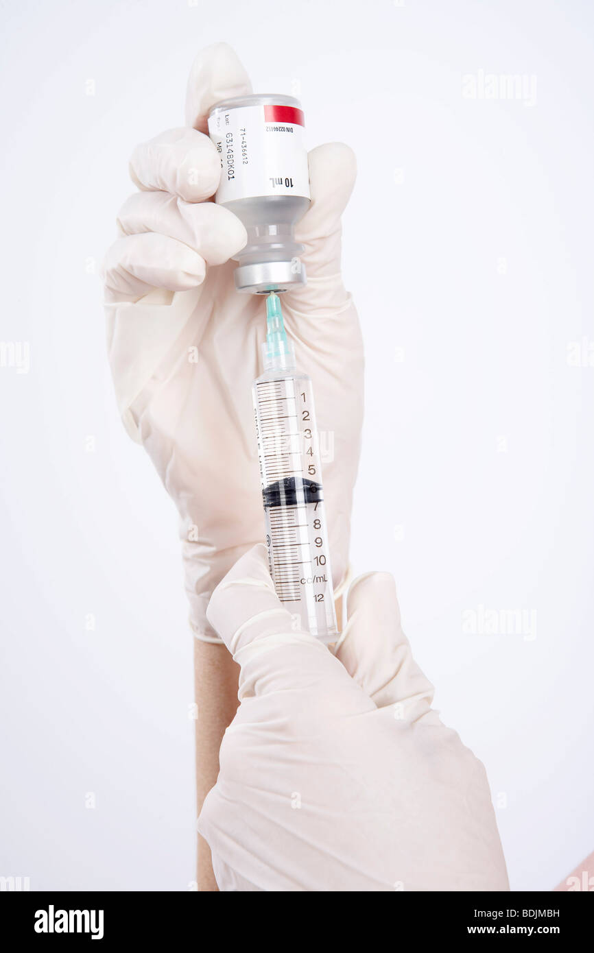 Nurse Preparing a Needle Stock Photo - Alamy