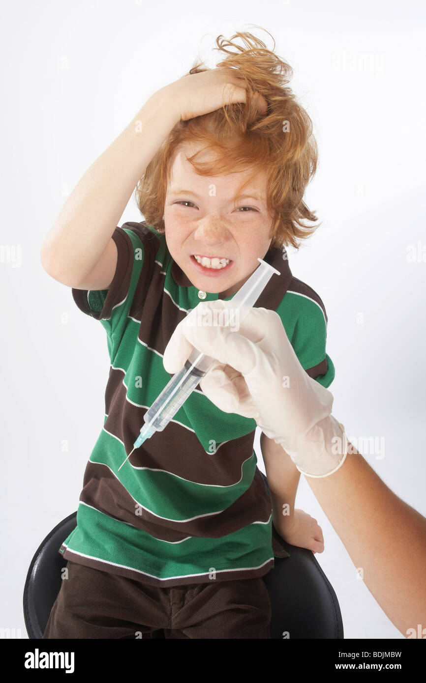 Young Female Nurse Holding Hypodermic Syringe High Resolution Stock ...