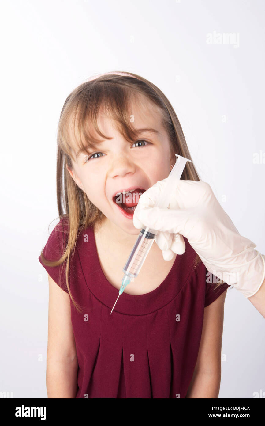 Anxious Girl About to Get a Needle Stock Photo - Alamy