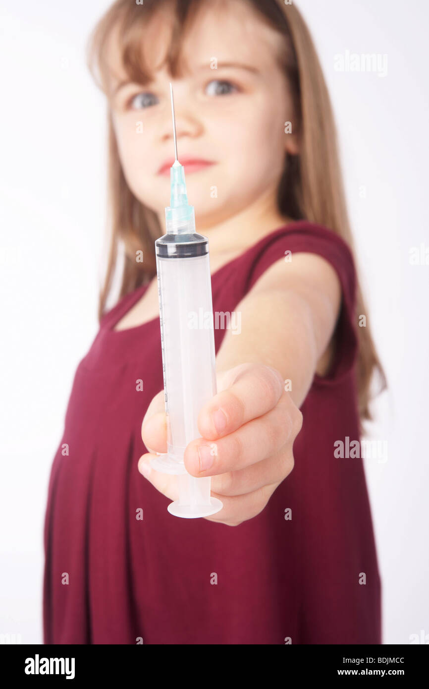 Girl Holding a Needle Stock Photo - Alamy