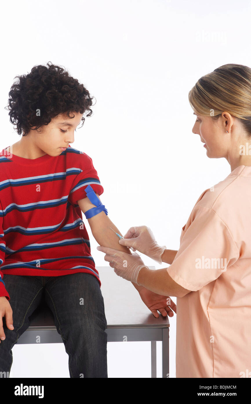 Boy Getting a Needle Stock Photo - Alamy