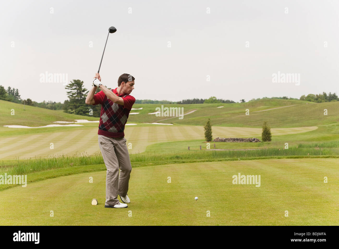 Man Playing Golf Stock Photo - Alamy