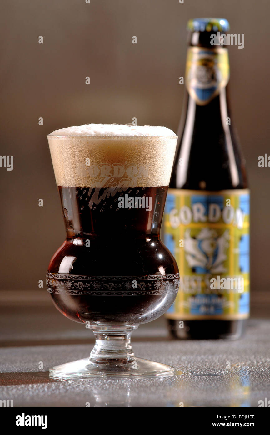 Glass and bottle of Gordon Xmas Belgian beer Stock Photo - Alamy