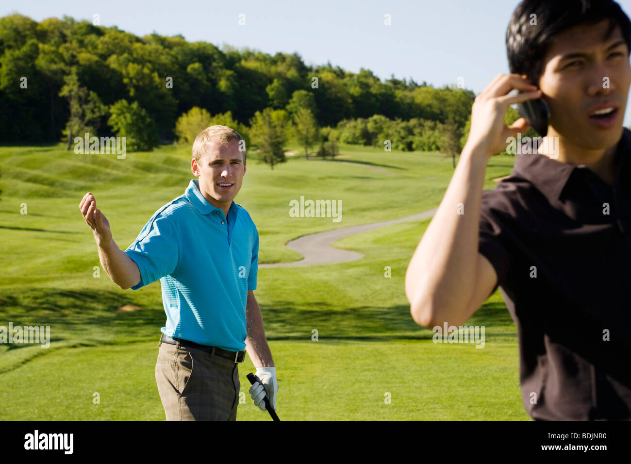 Men Playing Golf Stock Photo - Alamy