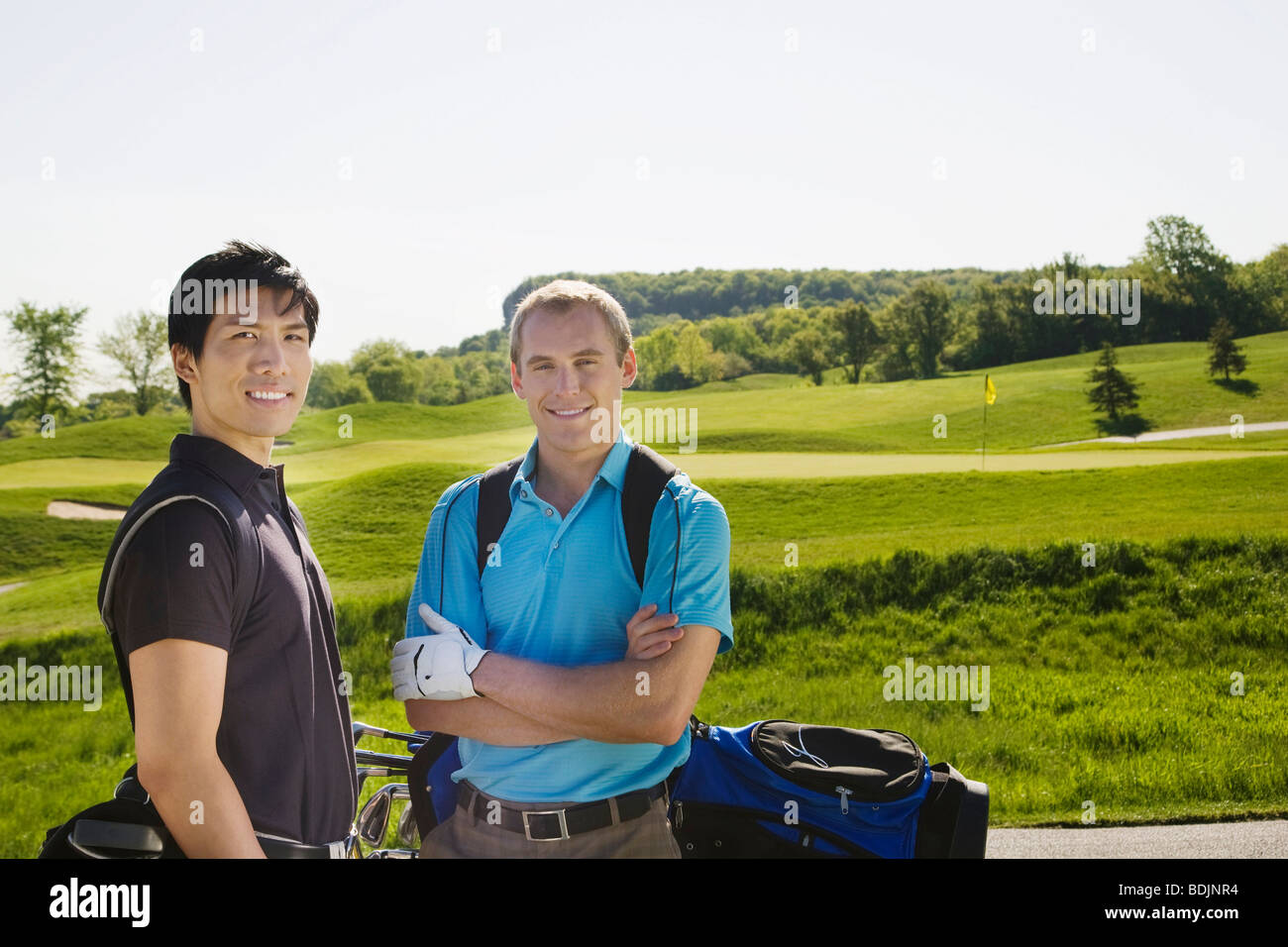 Men at Golf Course Stock Photo - Alamy