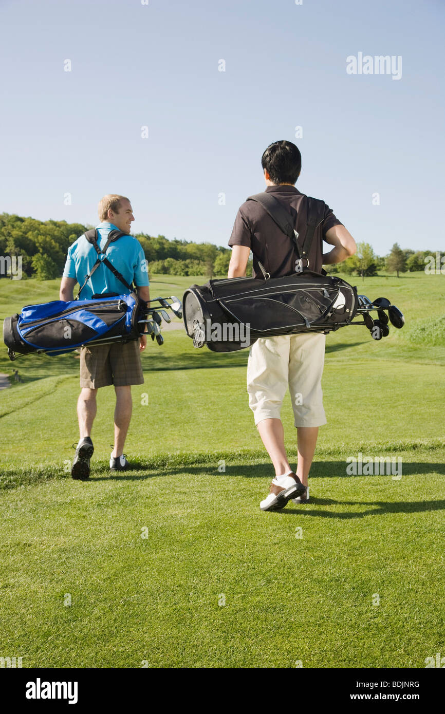 Men at Golf Course Stock Photo - Alamy