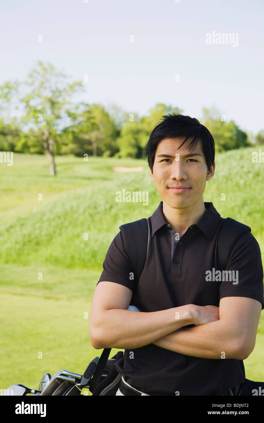 Portrait of Man at Golf Course Stock Photo - Alamy