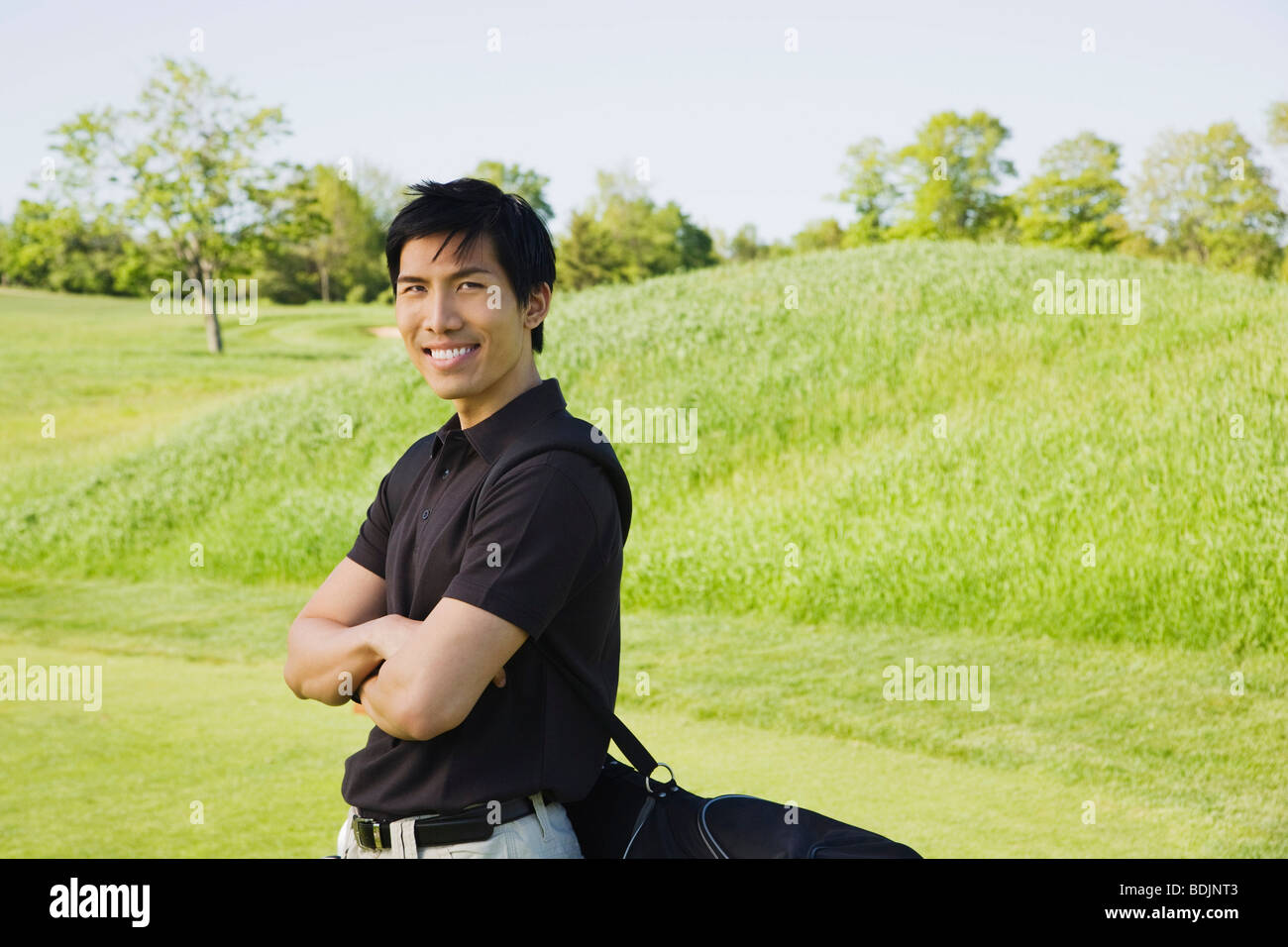 Portrait of Man at Golf Course Stock Photo - Alamy