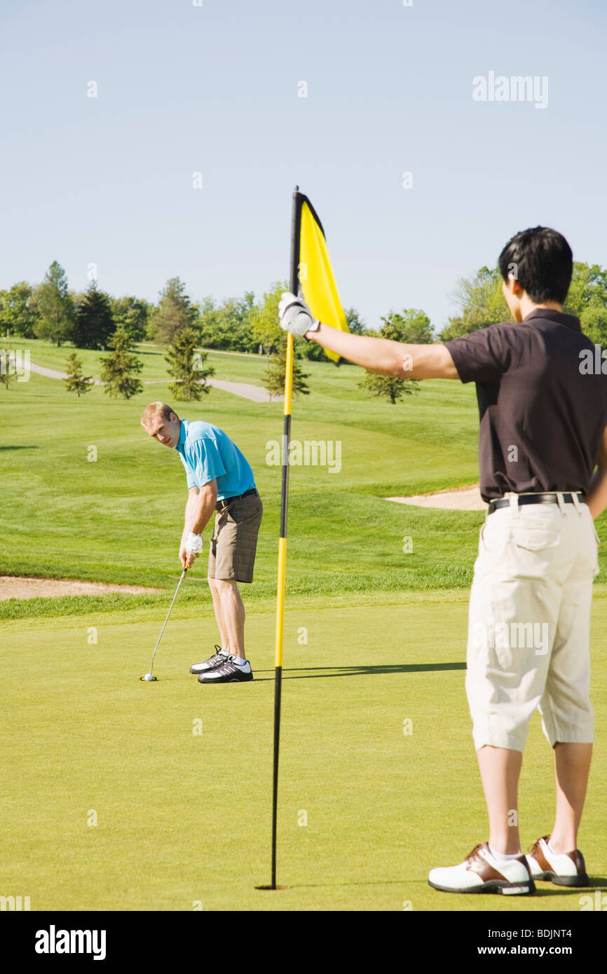 Men Playing Golf Stock Photo - Alamy