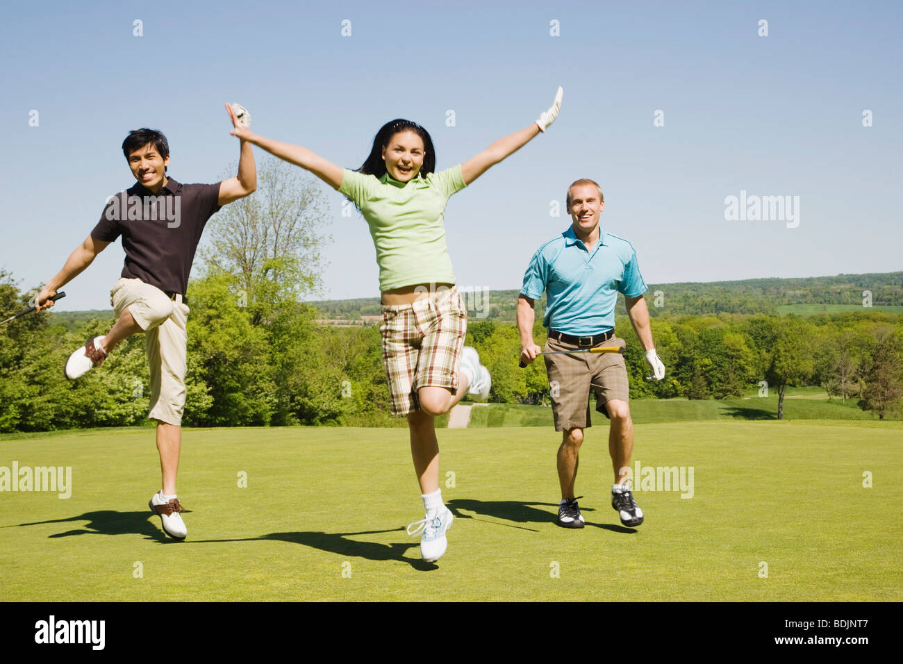 People at Golf Course Stock Photo - Alamy