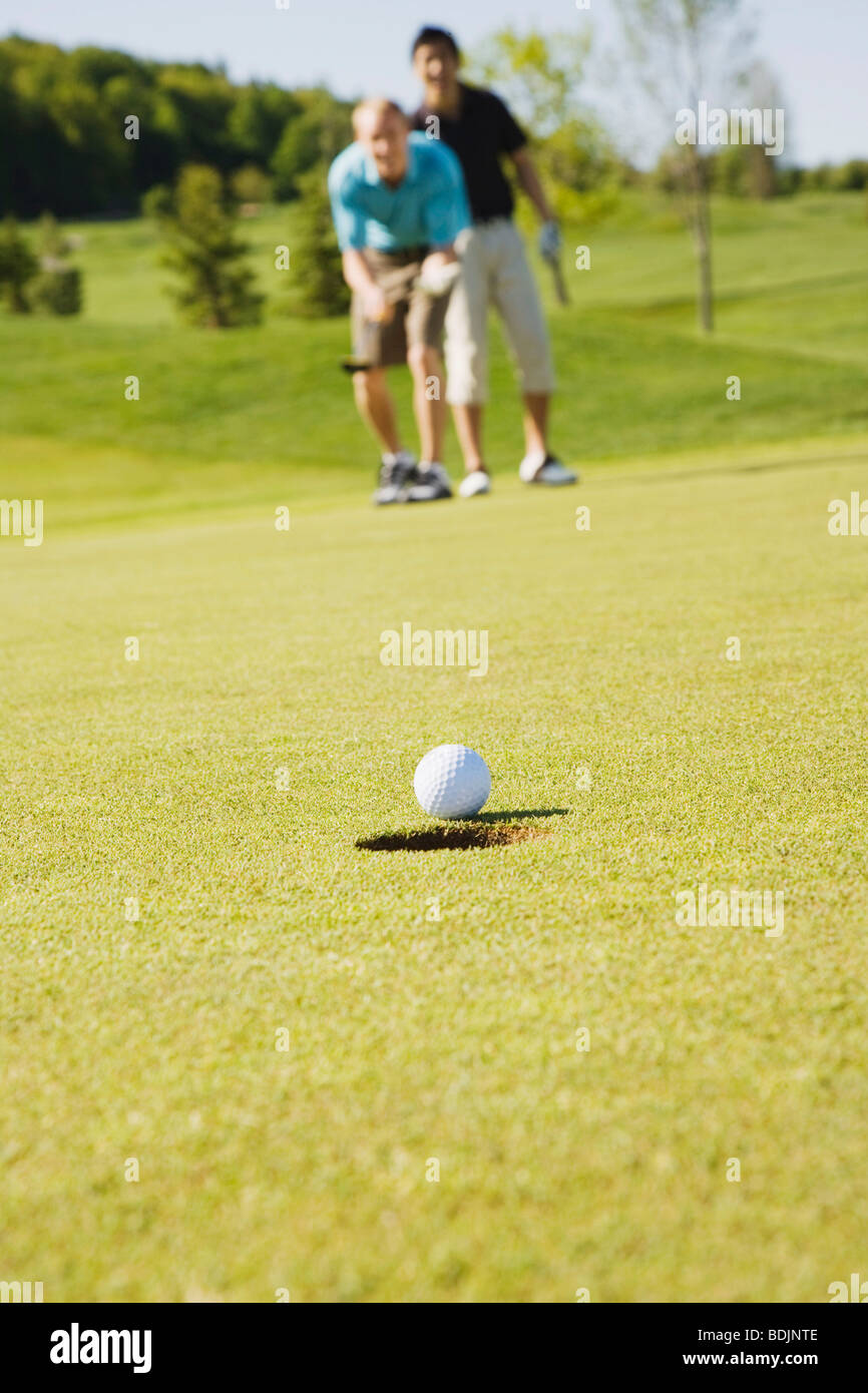 Men Playing Golf Stock Photo - Alamy