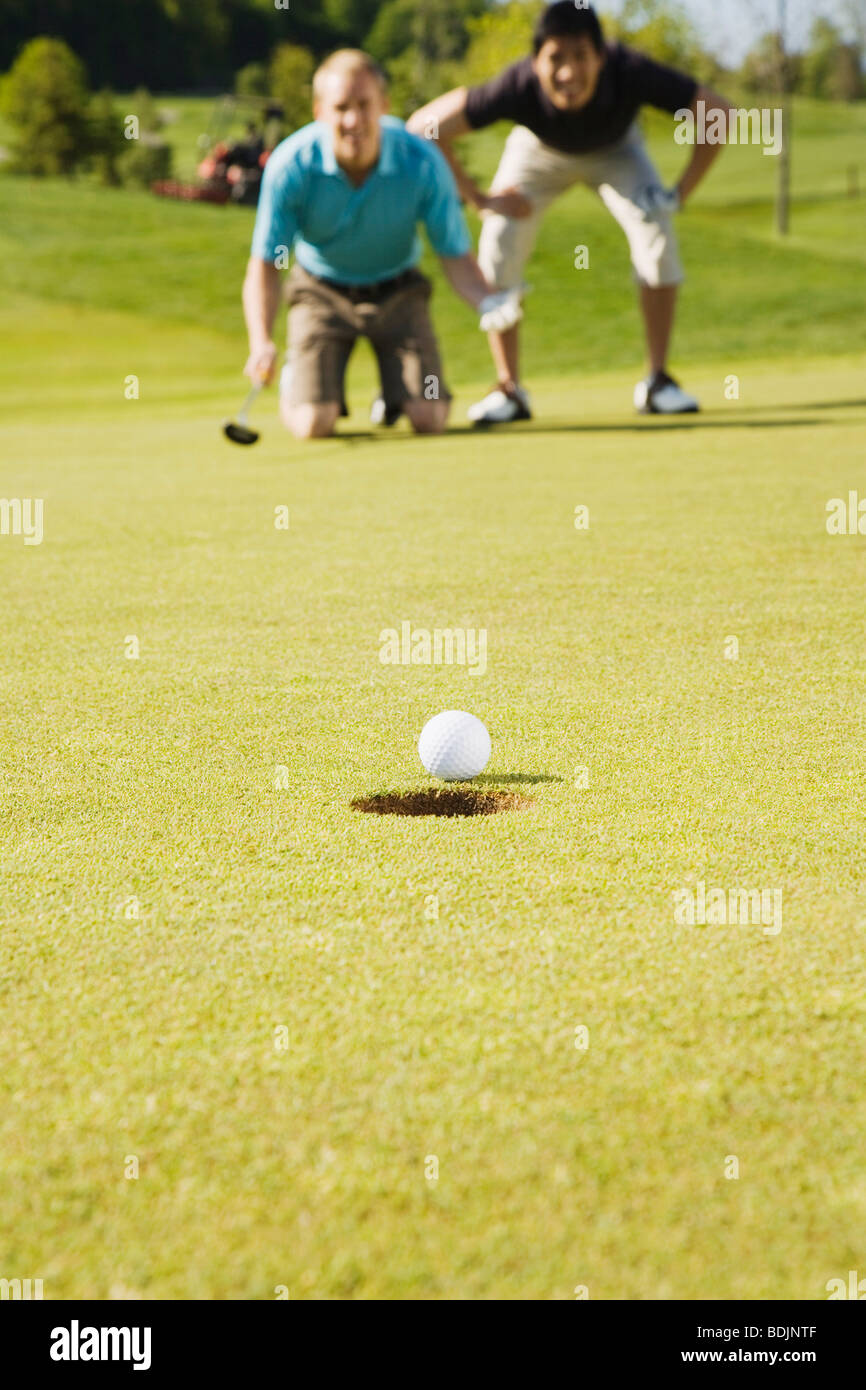 Men Playing Golf Stock Photo - Alamy