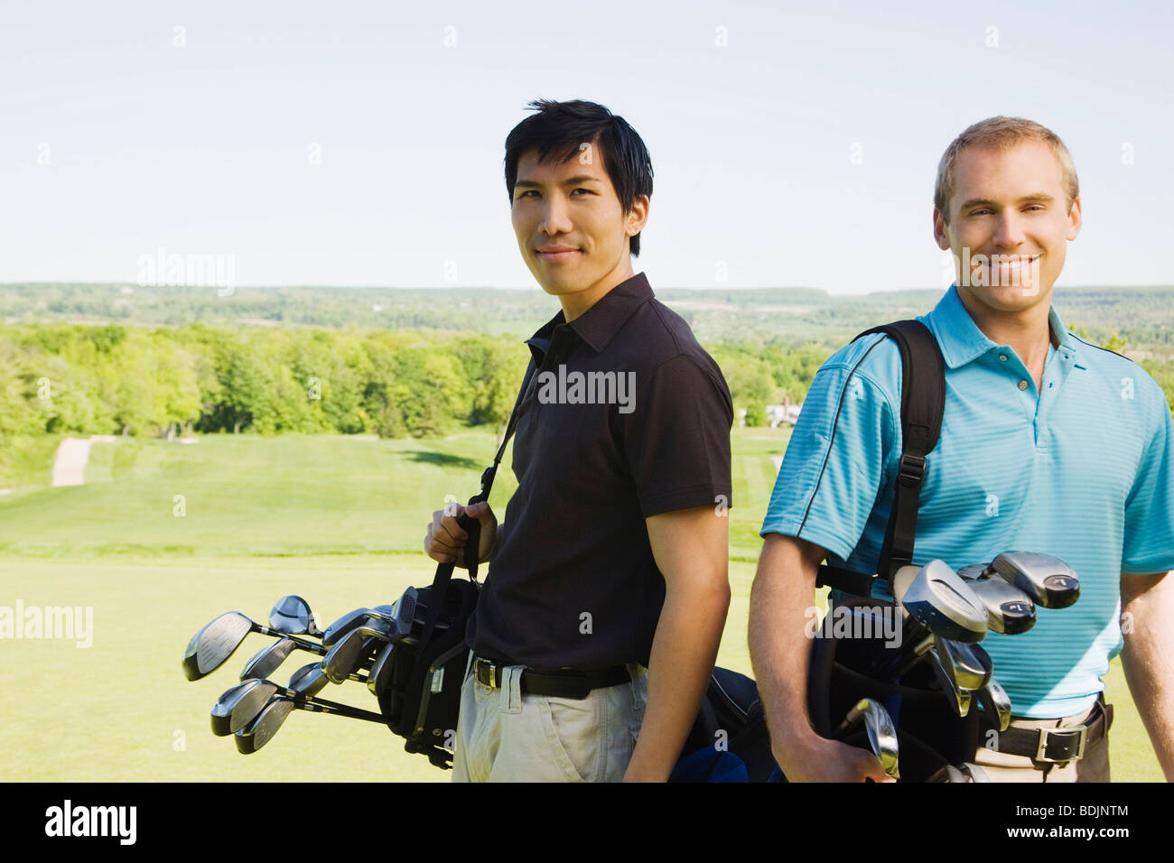 Men at Golf Course Stock Photo - Alamy