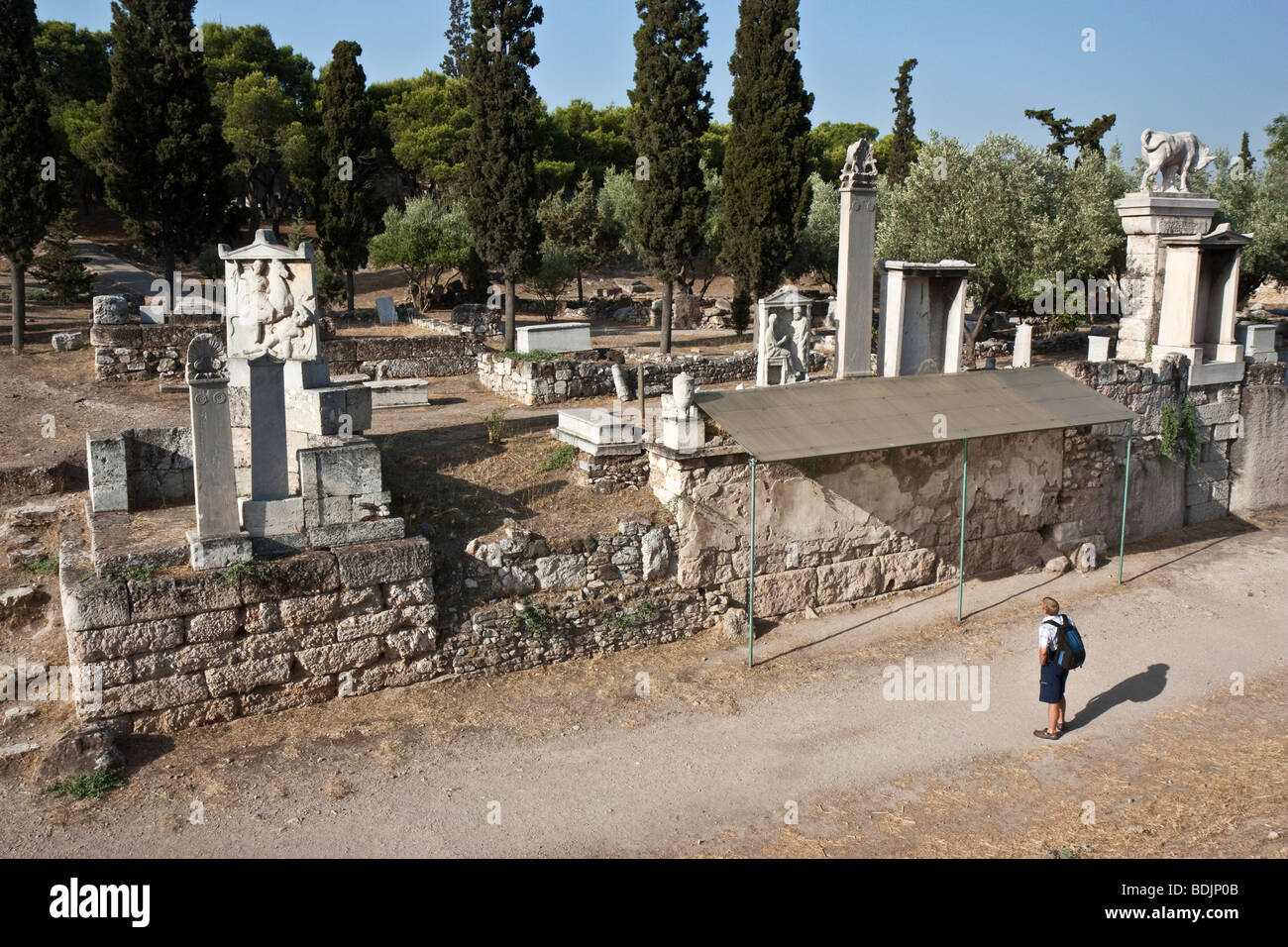 A man admires the sculpted grave stelae of the Kerameikos (ancient ...