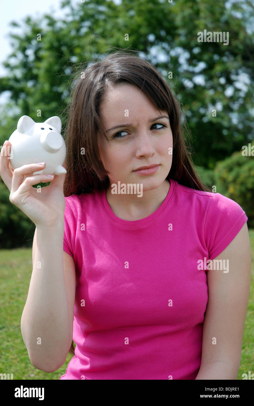 Whats in my piggy bank Stock Photo - Alamy