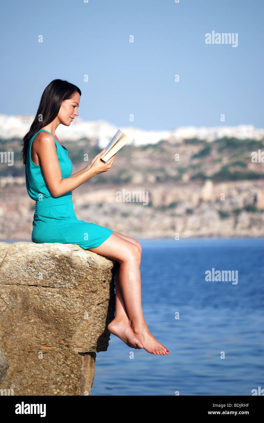 Beautiful woman reading book Stock Photo - Alamy