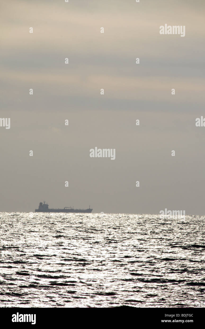 one oil tanker in the open sea in morning sun Stock Photo - Alamy
