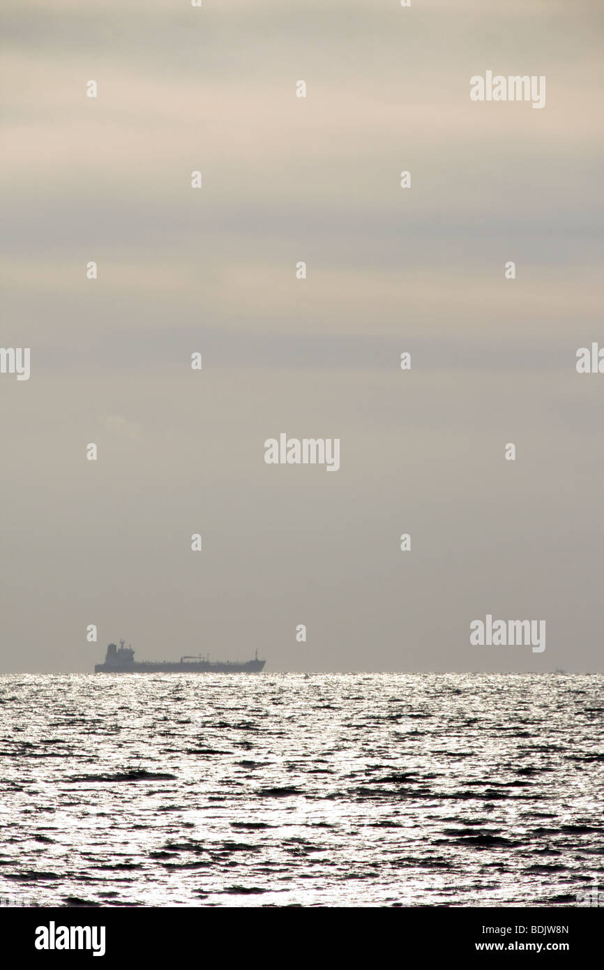 one oil tanker in the open sea in morning sun Stock Photo - Alamy