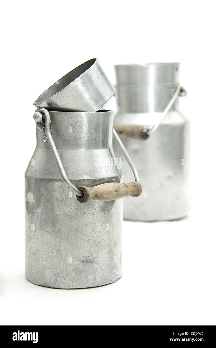 old vintage metalic vintage milk jar Stock Photo - Alamy