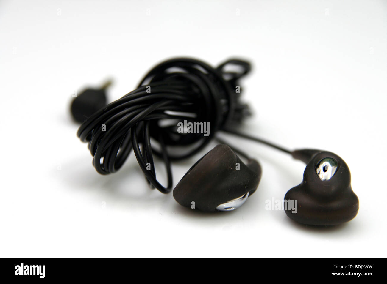 Cutout of a pair of earphones on white background Stock Photo - Alamy