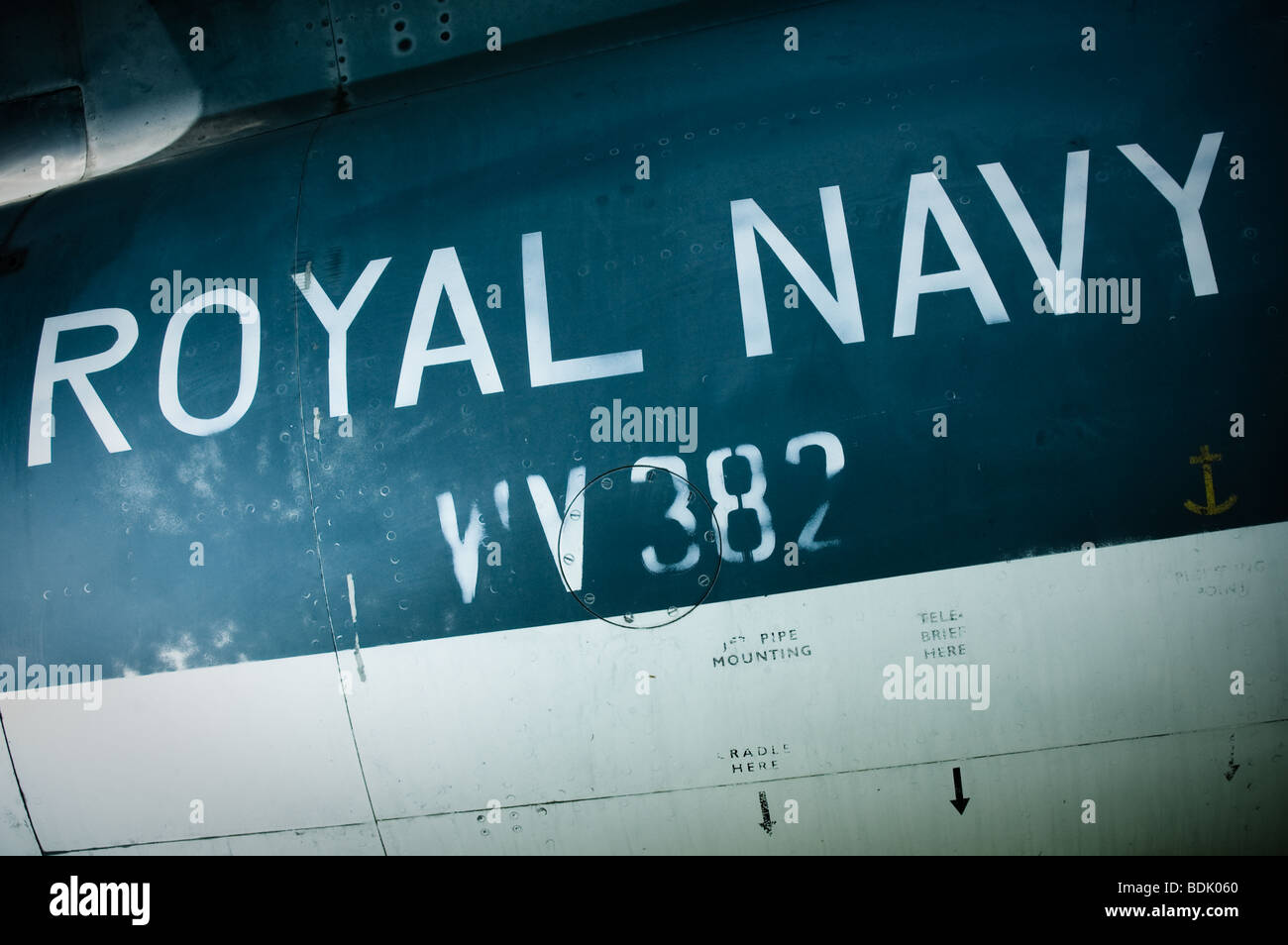 Royal Navy Wording on side of aircraft fuselage. White on blue Stock ...