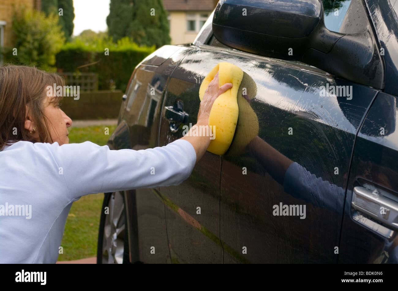 People washing cars hi-res stock photography and images - Alamy