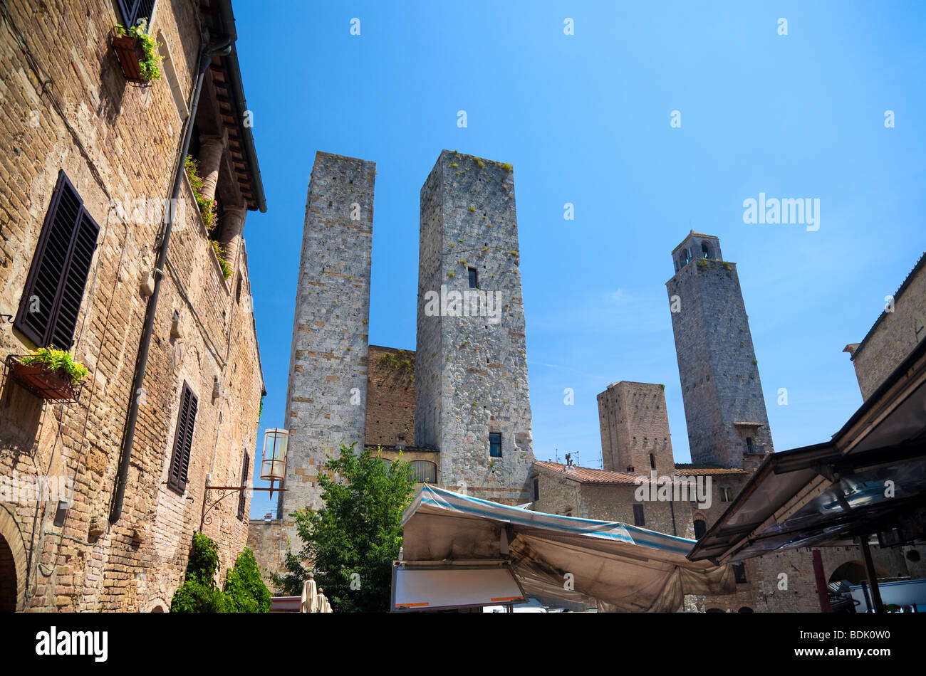 High ancient towers in Italian city. Wide angle view Stock Photo - Alamy