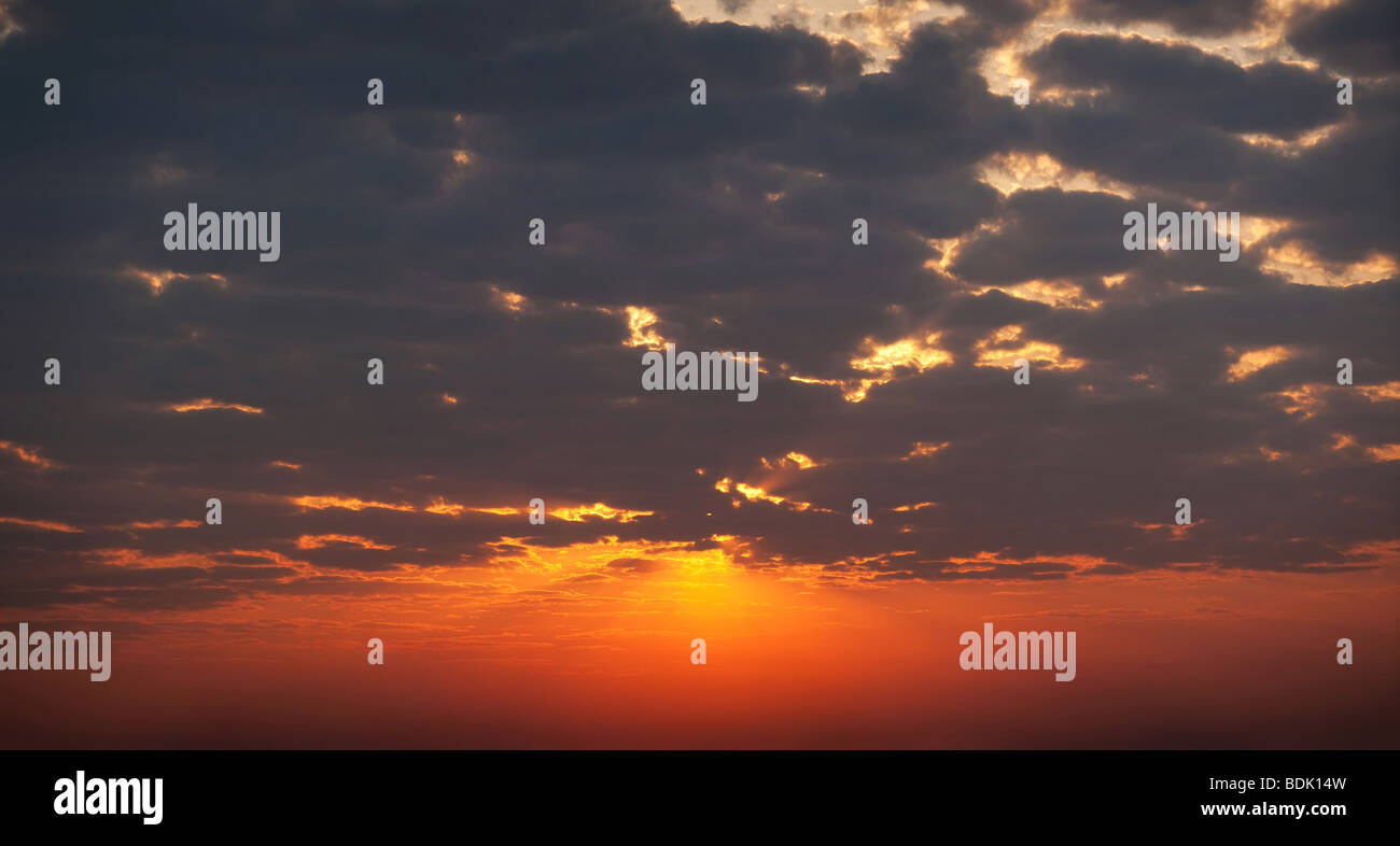 Dramatic red morning sky with clouds Stock Photo - Alamy