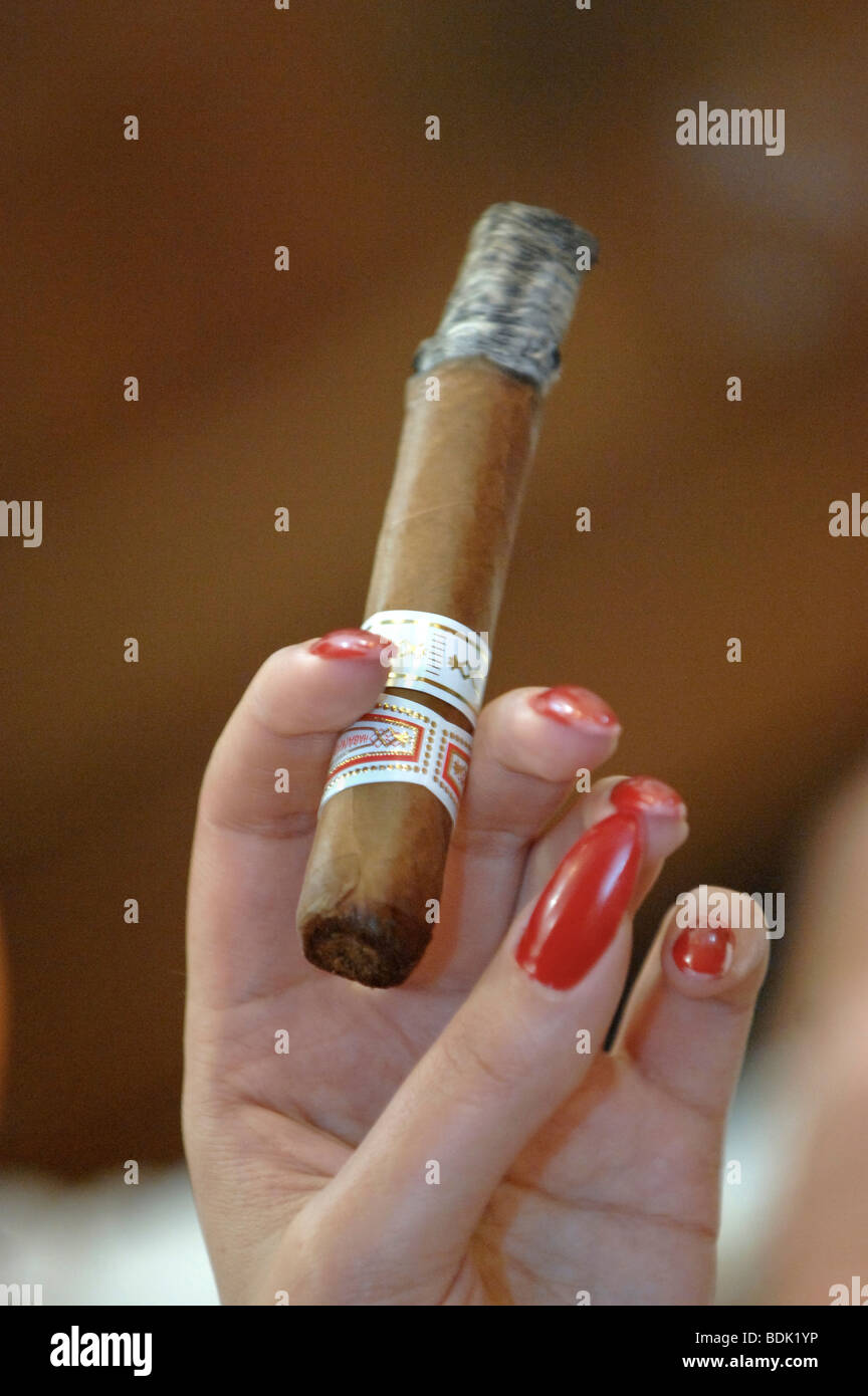 Smoking a Cuban cigar Stock Photo - Alamy