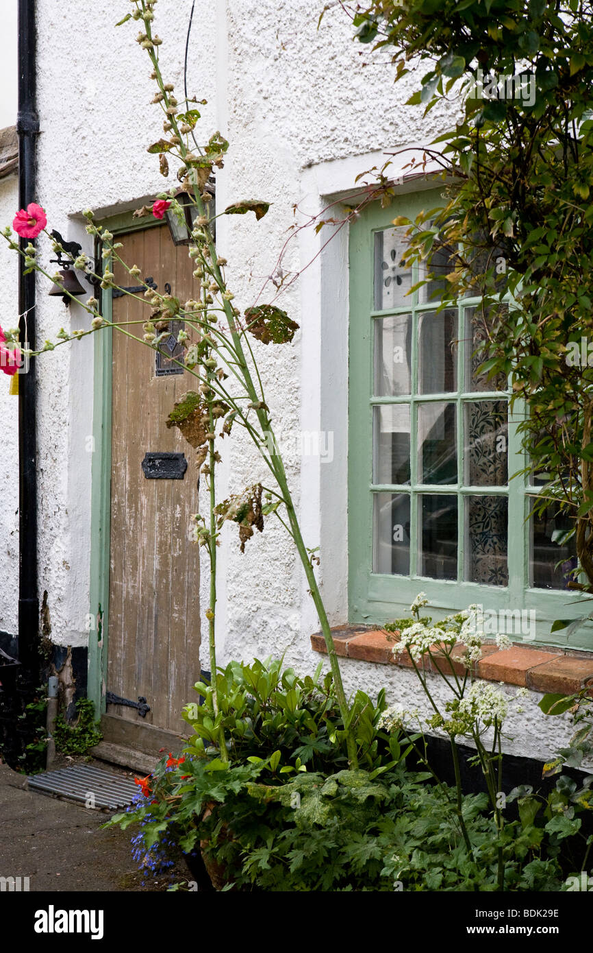 front view of cottage in an English village Stock Photo - Alamy