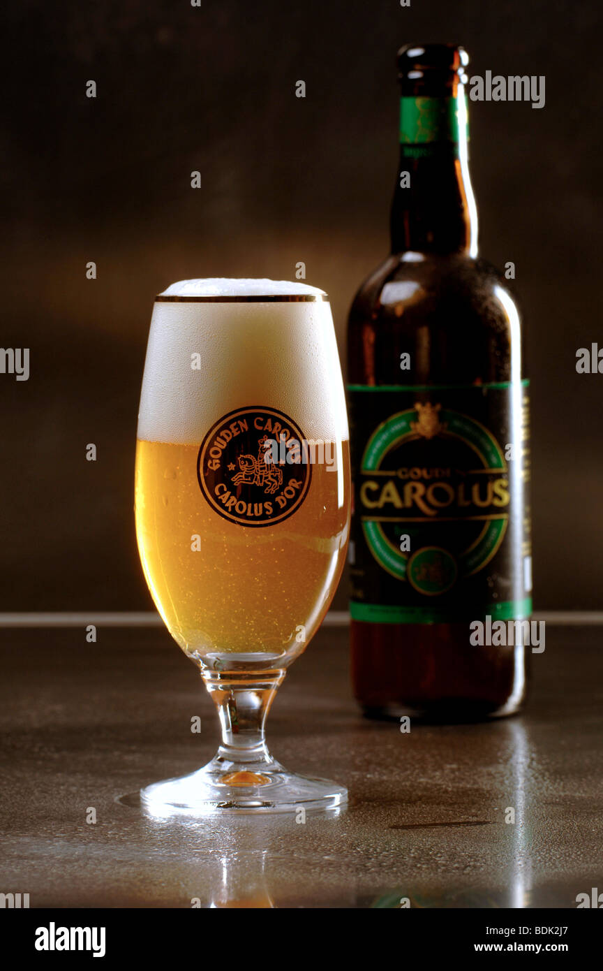 Glass and bottle of Gouden Carolus Belgian beer Stock Photo - Alamy