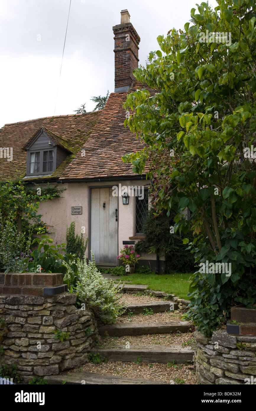 front view of cottage in an English village Stock Photo - Alamy
