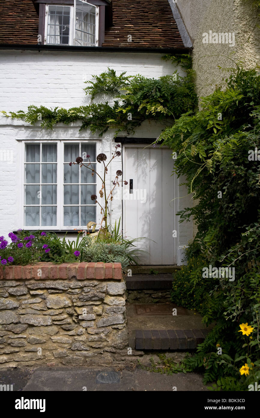 front view of cottage in an English village Stock Photo - Alamy