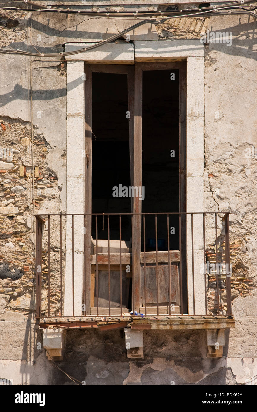 Broken balcony doors in Giardini Naxos Sicily Italy Stock Photo - Alamy