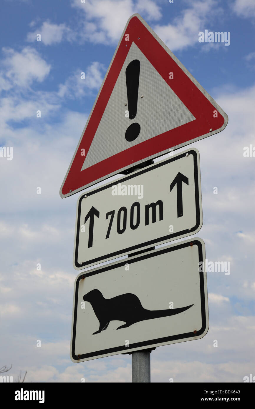 Otter crossing road sign (Otterwechsel). Photo by Willy Matheisl Stock ...