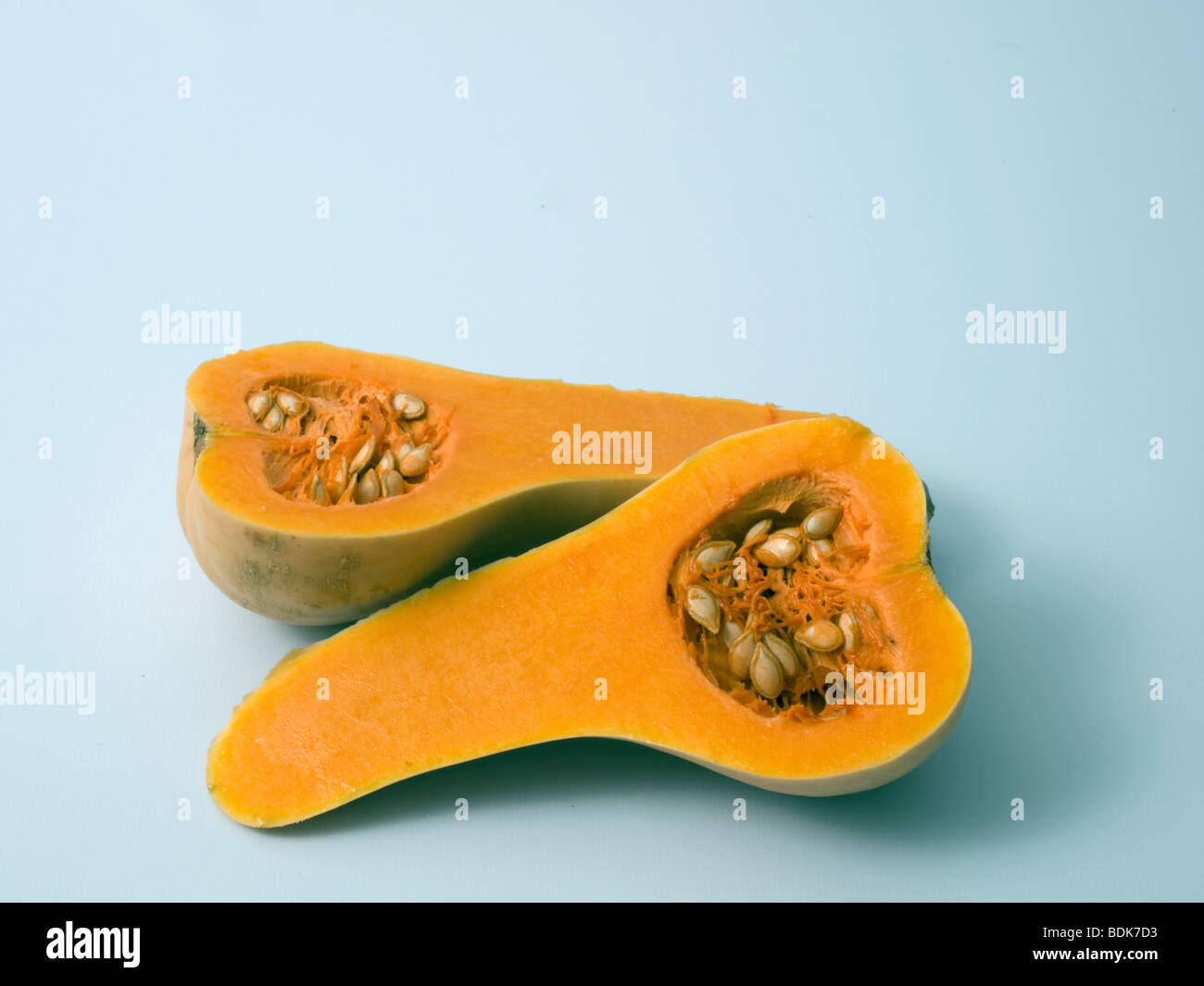 Butternut squash sliced in two Stock Photo - Alamy