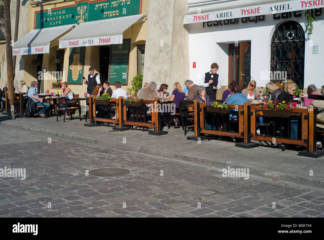 The terrace of a restaurant in the old Jewish part of Krokow Stock ...