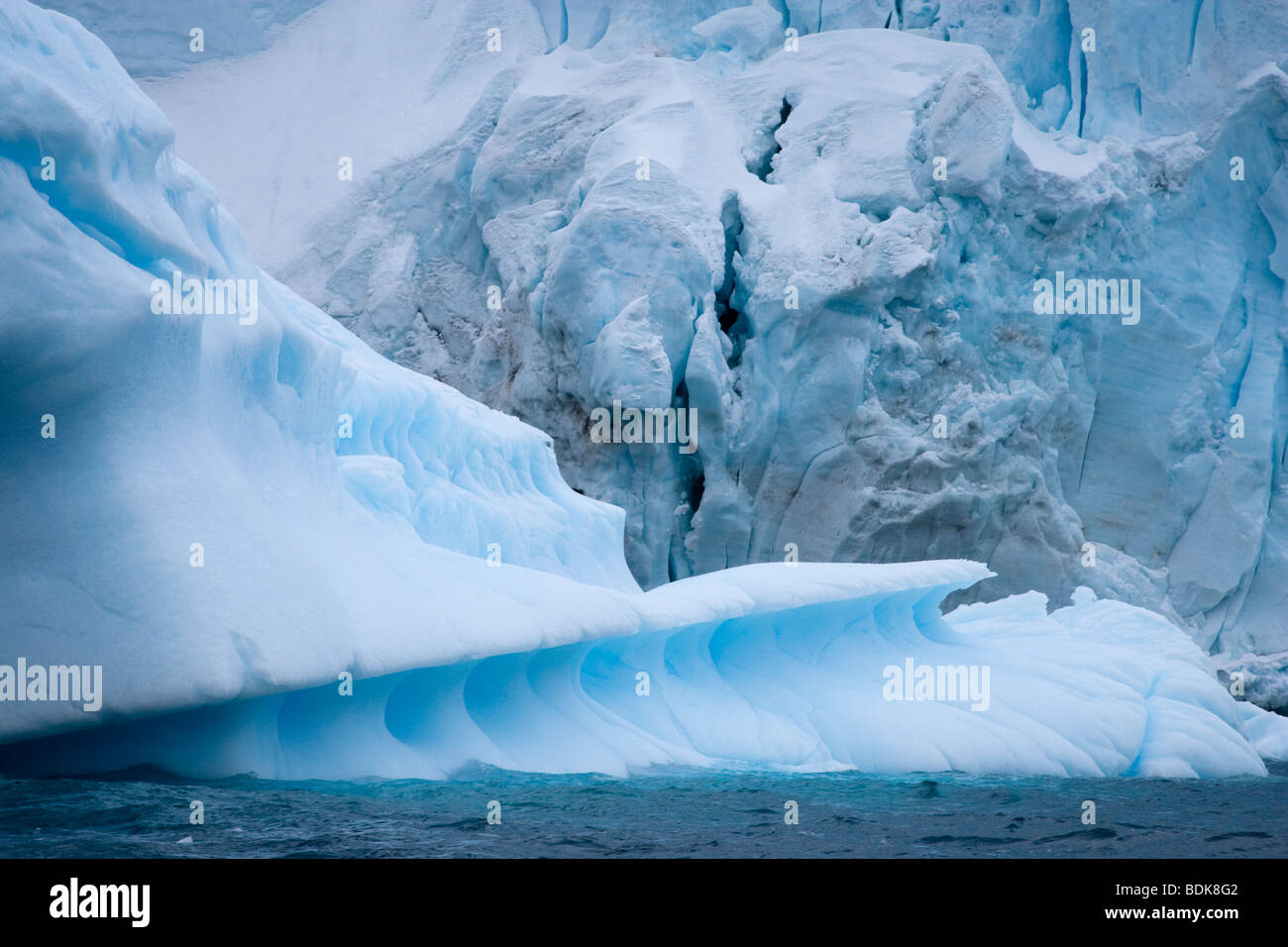 Beautiful big blue Iceberg unusual shape from erosion melting the ice ...